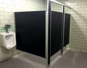 What materials are used for commercial bathroom partitions?